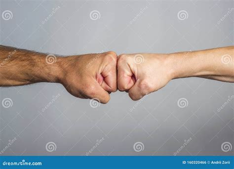 Two Male Fists Hitting Each Other Concept Of Confrontation Competition Etc Stock Photo Image