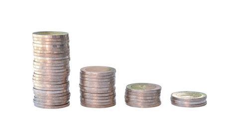 Premium Photo Silver Coins In Separated Stacks Are Isolated On White