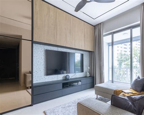Wall Mounted TV Cabinet Design With White Terrazo Tiles For The Back