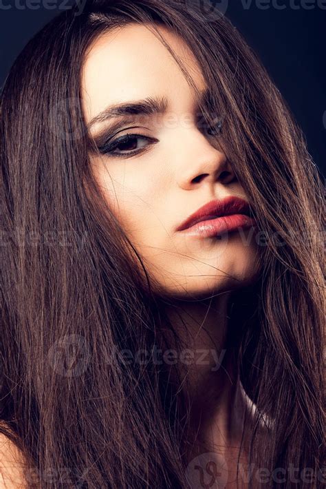 Feeling Seductive Attractive Young Woman Looking At Camera And
