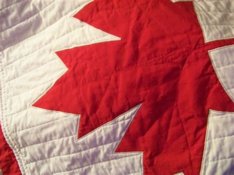 Close Up Of Maple Leaf On Flag Quilt Canadian Quilts Maple Leaf