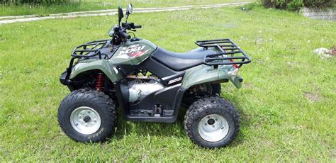 Quad Kymco Mxu 250 Opinie I Ceny Na Ceneo Pl
