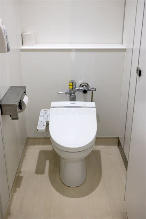 Public Toilet In Japan With Toilet Paper Dispenser And Automatic Bidet