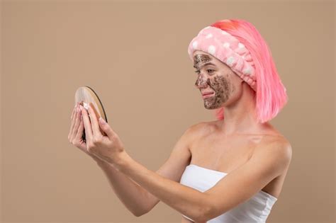 Premium Photo Facial Mask Young Girl With Pink Hair Having A