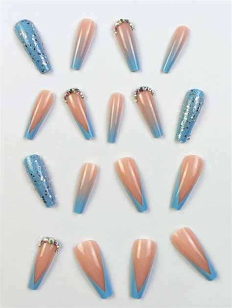 Upgrade Your Look With 24pcs Icy Blue French Tip Long Coffin Glittered