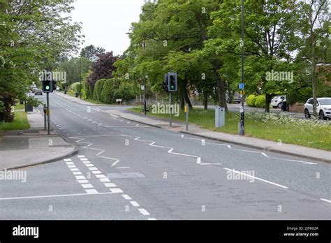 Empty Public Road In Harrogate Yorkshire With Traffic Lights And