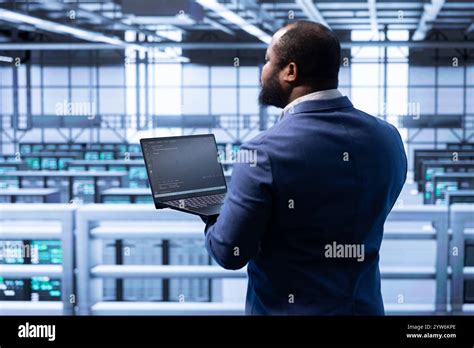 It Staff Member In Data Center Implementing Backup Solutions To Protect