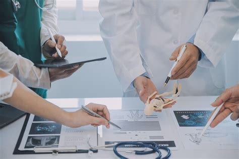 Premium Photo Multiracial Medical Team Having A Meeting With Doctors