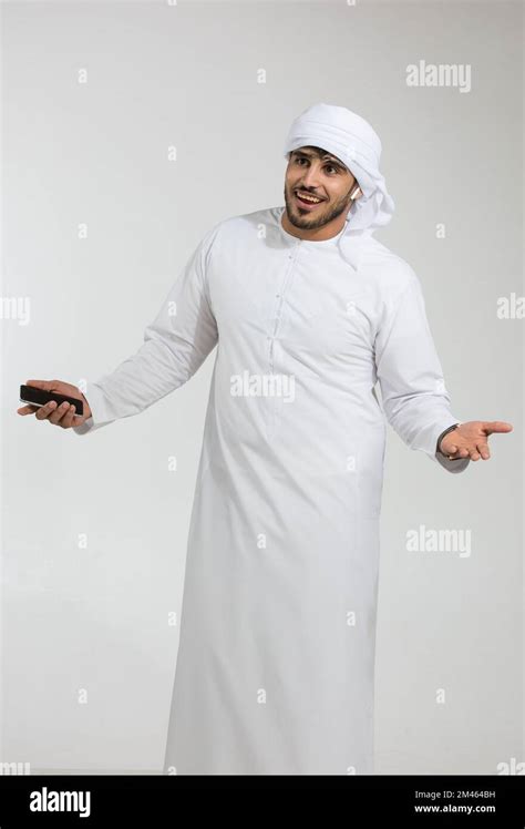 Emirati Man Talking On His Mobile Stock Photo Alamy