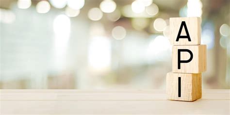 Interface De Programação De Aplicação Api Palavra Em Blocos De Madeira Sobre Fundo Desfocado