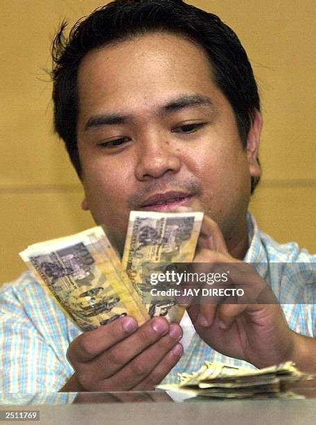 Us Dollars To Philippine Peso Photos And Premium High Res Pictures