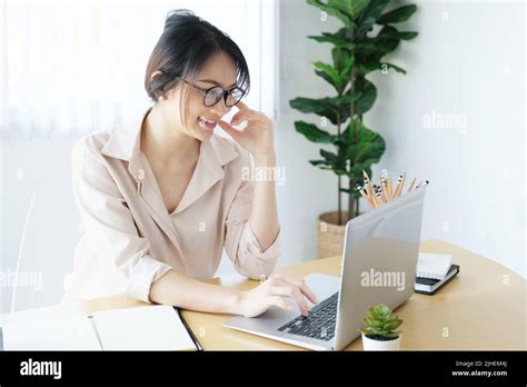 New Normal A Businesswoman Useing Computer To Work For A Company Via