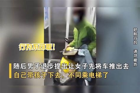 女子强行推电动车进电梯，男子带娃担心安全隐患