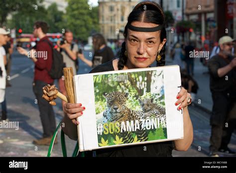 Extinction Rebel And Brazilian Activists Gather Outside The Brazilian