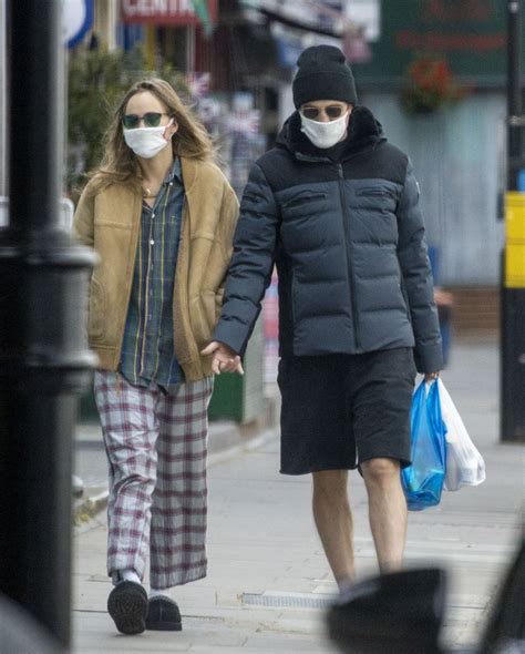 Suki Waterhouse And Robert Pattinson Out For A Stroll In London 0513