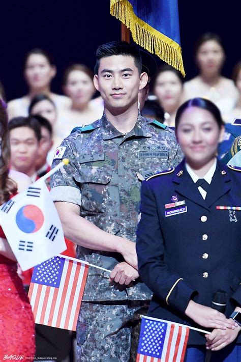 Recent Photos Of 2pm Taecyeon In Army Show His Drastic Body Transformation