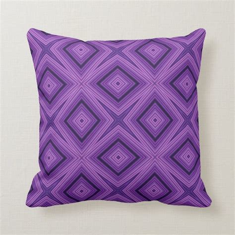 A Purple Pillow With An Abstract Design