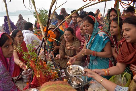 Hindu Devotees Performing Rituals After Taking Holy Dip In The Yamuna