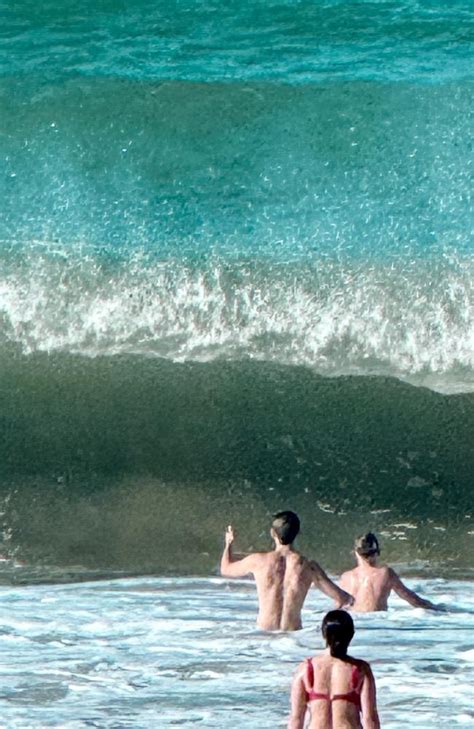 Surfers And Swimmers Crunched In Big Waves Off Mooloolaba Photos