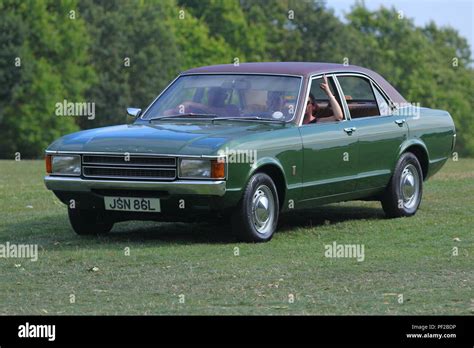 A Classic Ford Consul Leaving A Classic Car Show At Temple Newsam In Leeds Stock Photo Alamy