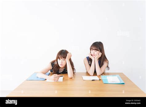 Babes Bored In Class Stock Photo Alamy