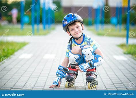 Smiling Boy With Inline Skates And Protective Gear Stock Image Image