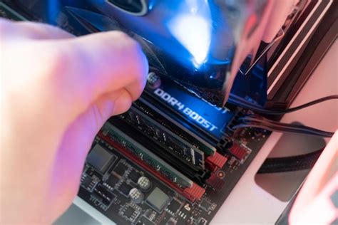 Premium Photo The Inserting Plug In The Ram Ddr Memory Card In The Computer Mainboard Random