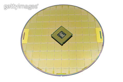 Photo Of A Computer Chip CPU Put On Silicon Wafer With Microchip