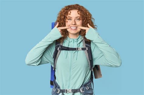 Premium Photo Young Caucasian Redhead Ready For Hiking Smiles