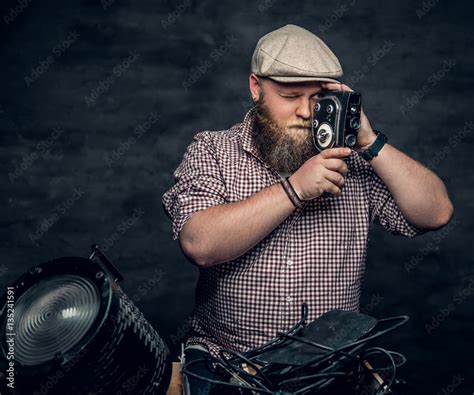 A Man Holds Vintafe Camera Stock Foto Adobe Stock