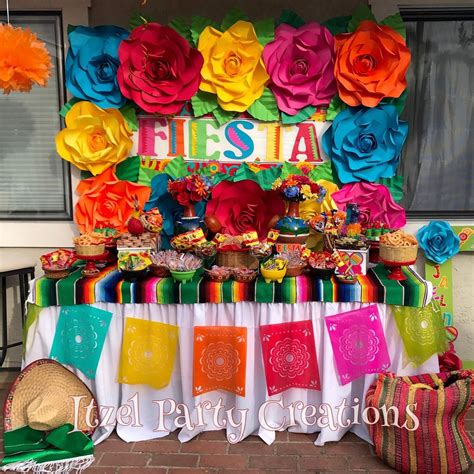 An Image Of A Colorful Fiesta Themed Dessert Table
