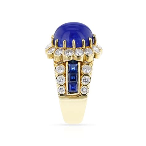 Van Cleef And Arpels Sapphire Cabochon And Diamond Floral Ring 18k At