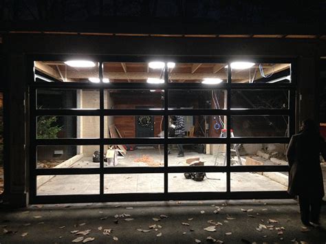 Oversized Aluminum Clear Glass Garage Door During The Installation In