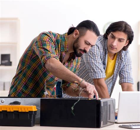 It Engineers Working On Hardware Issue Stock Photo Image Of Refurbishing Desktop