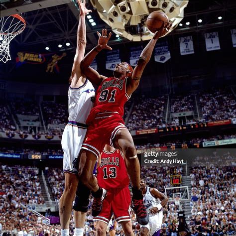 Dennis Rodman Of The Chicago Bulls Goes Up For A Hook Shot Against