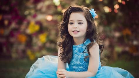 Premium Photo Beautiful And Cute Girl In Blue Dresses With Beautiful