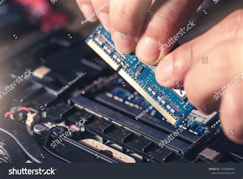 Technician Laying Ram On Socket Computer Stock Photo Edit Now