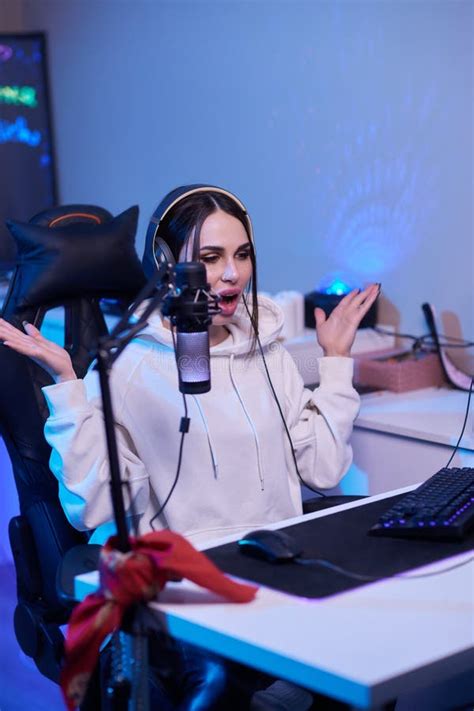 Happy Woman Putting On Headphones And Playing Computer Game Female