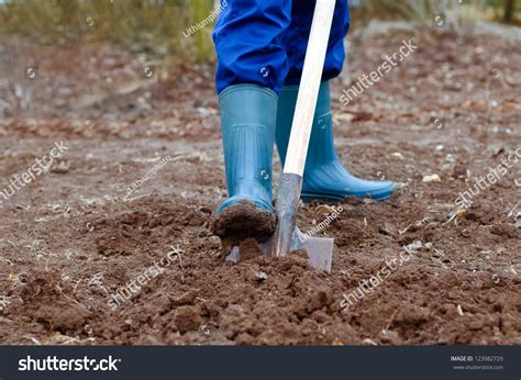 Close Man Digging Soil Shovel Rubber Stock Photo Edit Now 123982729
