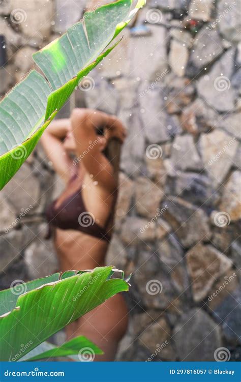 Beautiful Woman Taking Outdoor Shower After Sunbathing Stock Image