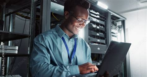 Happy Man Technician And Laptop In Server Room For Database Update