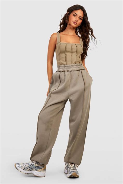 Washed Khaki Exposed Seam Detail Oversized Cuffed Joggers Boohoo Uk