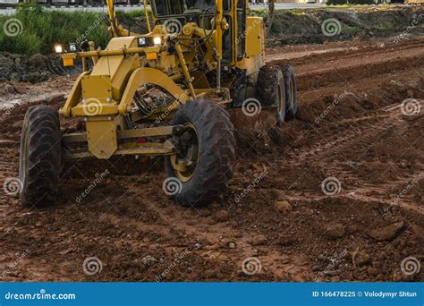 Grader Is Working On Road Construction Grader Industrial Machine On Construction Of New Roads