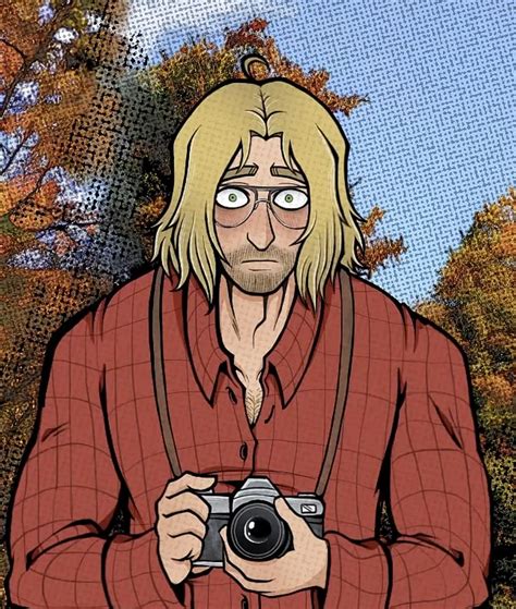 A Man With Blonde Hair Holding A Camera