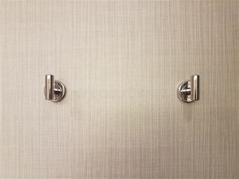 Metalic Metal Coat Hook Or Fixture On Grey Wall Stock Image Image Of