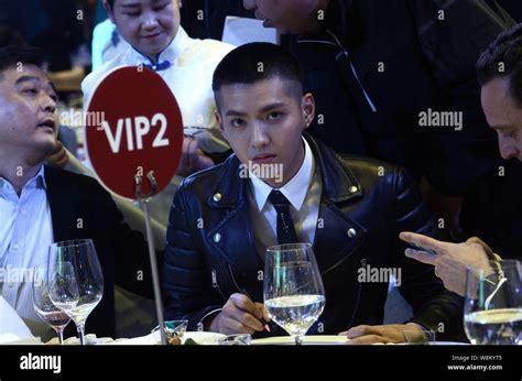 Chinese Singer And Actor Kris Wu Yifan Center Signs Autographs For