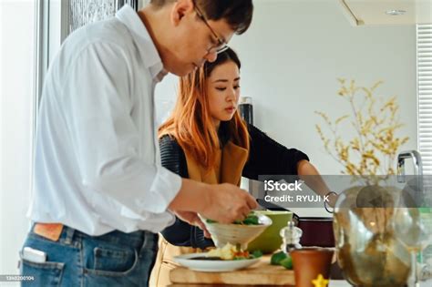 Asian Step Father And Daughter Preparing Christmas Food Together Stock