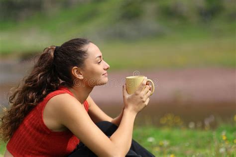 Woman Drinking Coffee In The Mountain Looking Away Stock Image Image