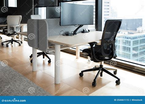 Modern Interior Design For An Office With Computers And Furniture Stock