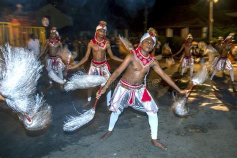Chamara Dancers Perform Along The Streets Of Kandy During The Esala